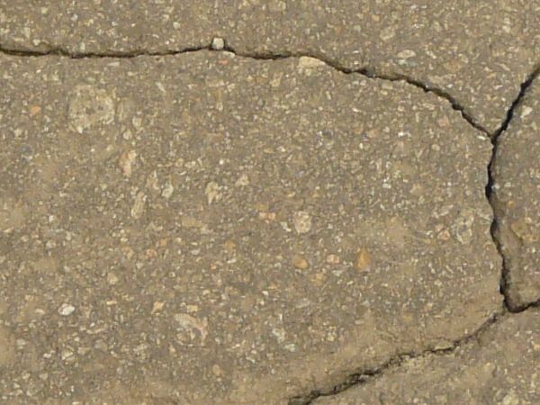 cracked road with rocks texture 0016 - Texturelib