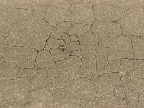 cracked road with rocks texture 0016 - Texturelib
