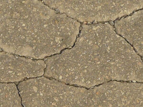 cracked road with rocks texture 0016 - Texturelib